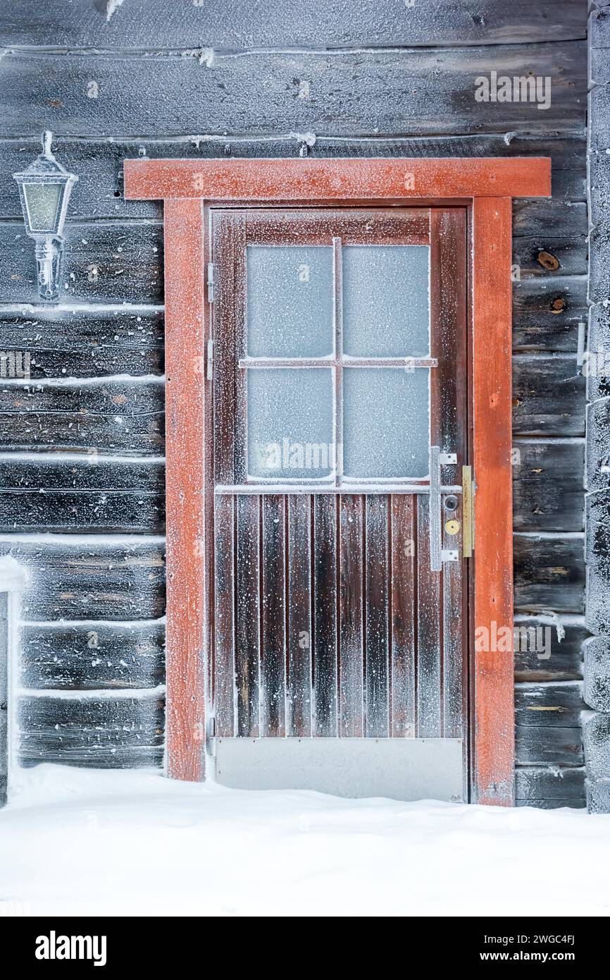 Europe, Finland, Lapland, frozen wooden house, ice window Stock Photo ...