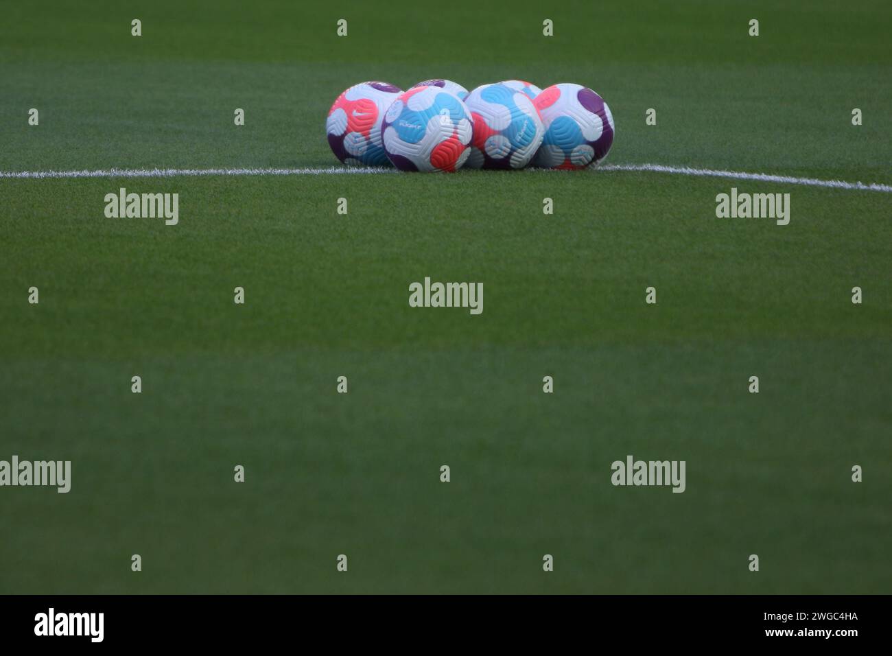 Footballs on grass pitch ready for warm up England v Spain, UEFA Womens ...