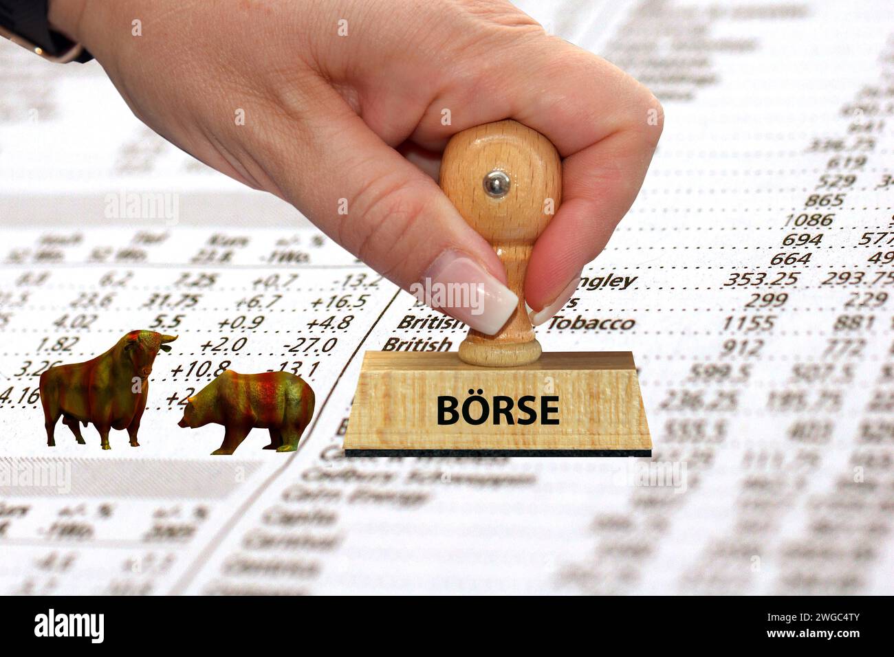 Bull and bear on a list with shares, stamp, stock exchange Stock Photo ...