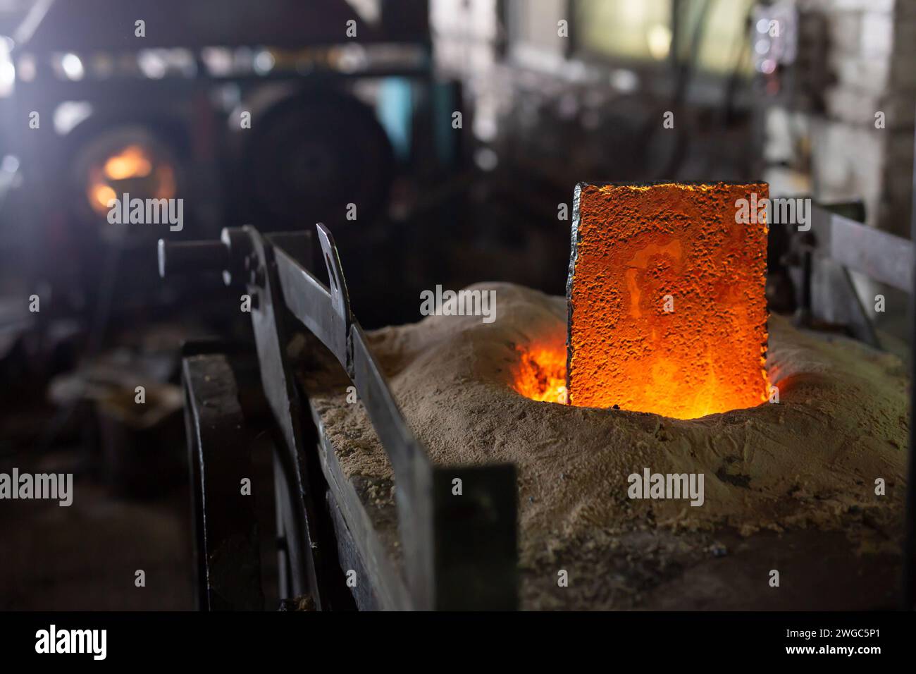 Foundry - ferrous metal is melted in an induction furnace of ...
