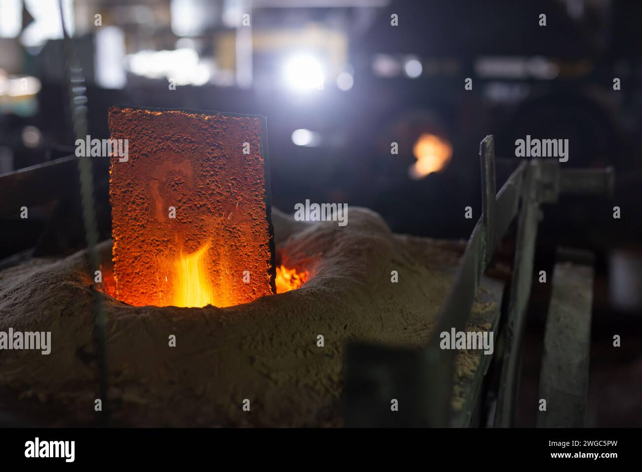 Foundry - ferrous metal is melted in an induction furnace of ...