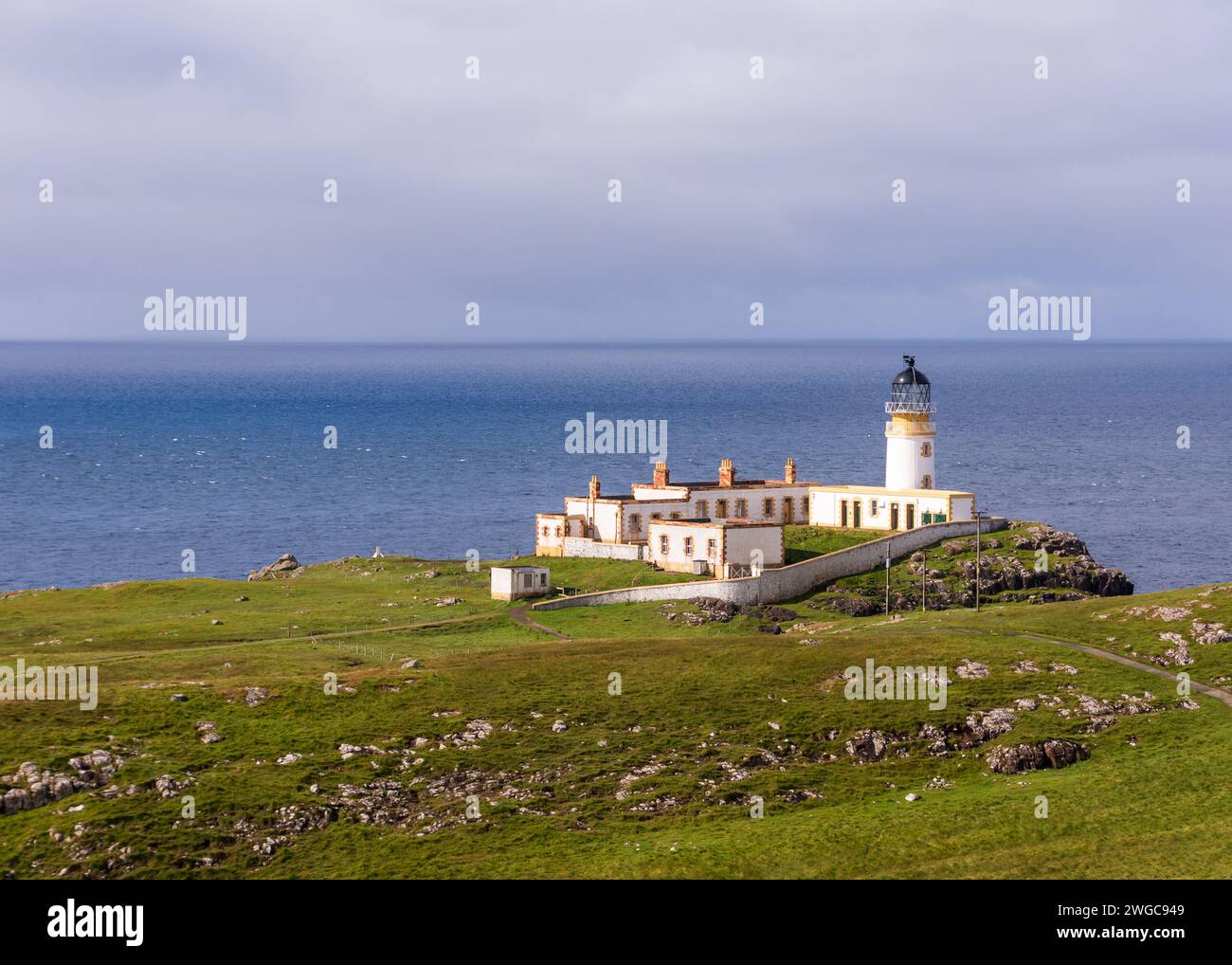 A view of Neist Point, a famous lighthouse on the Isle of Skye ...