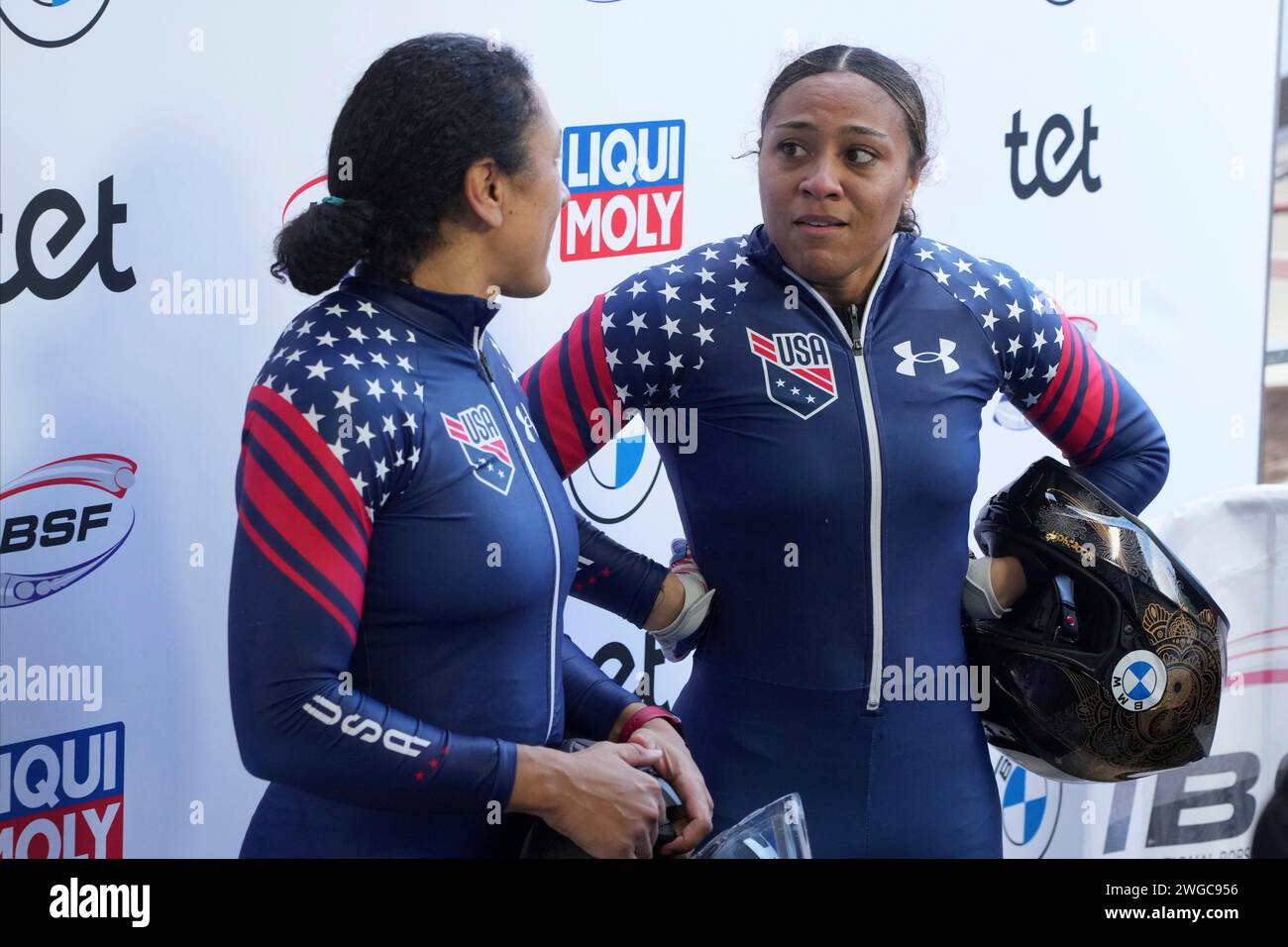 Fifth placed Elana Meyers Taylor and Azaria Hill of USA react after ...