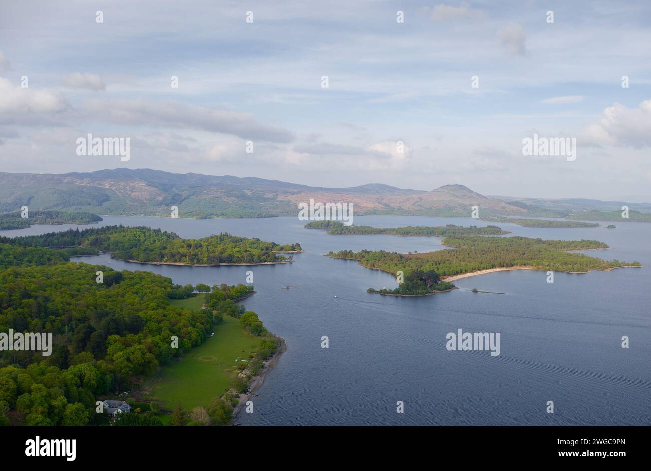 Loch Lomond aerial view showing islands Inchtavannach, Inchconnachan ...