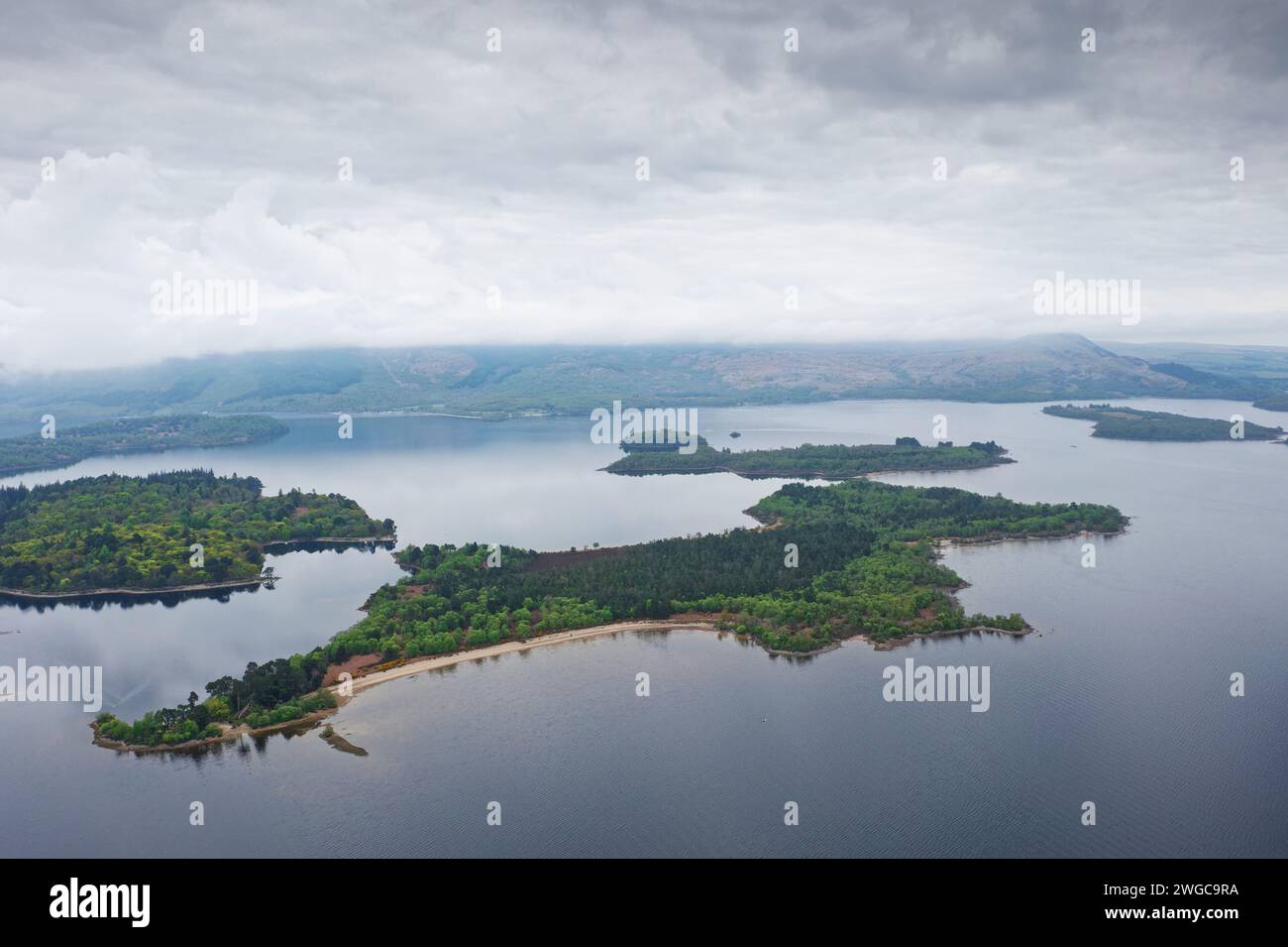 Loch Lomond aerial view showing islands Inchtavannach, Inchconnachan ...