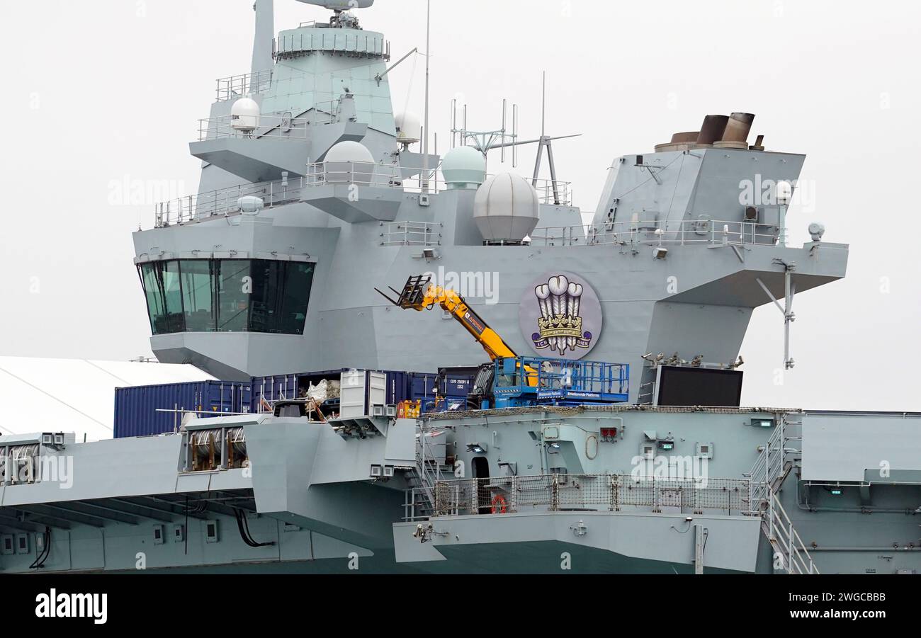 Work is undertaken on the flight deck of the Royal Navy aircraft ...