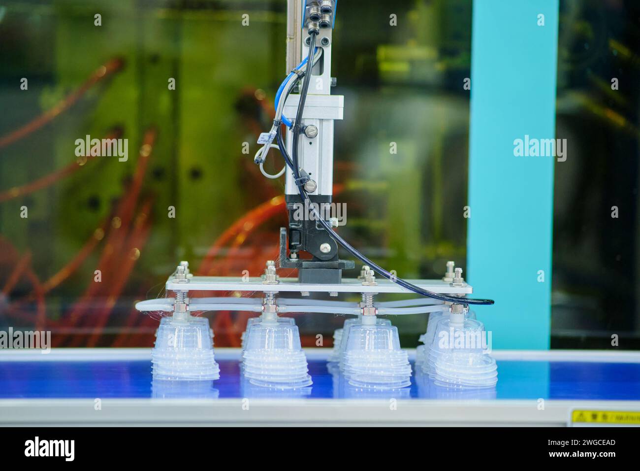 The process of manufacturing plastic products in automated production ...