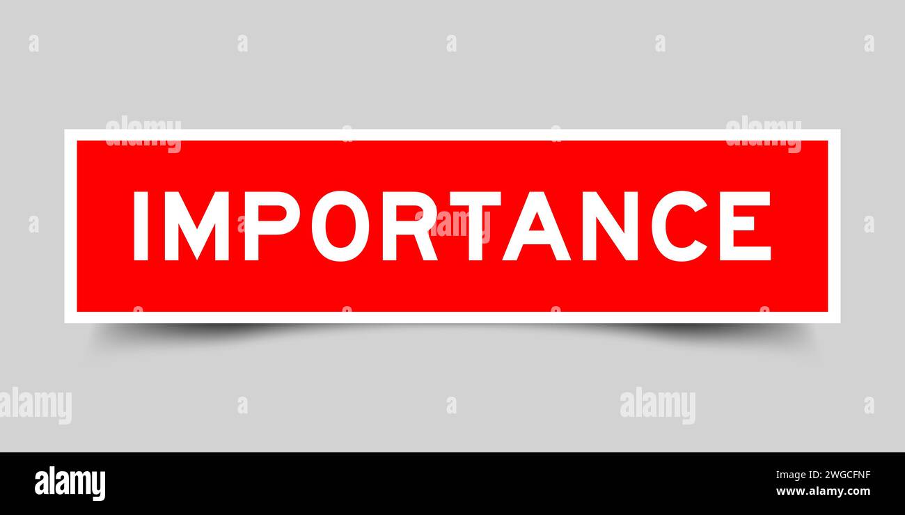 Red color square shape sticker label with word importance on gray ...