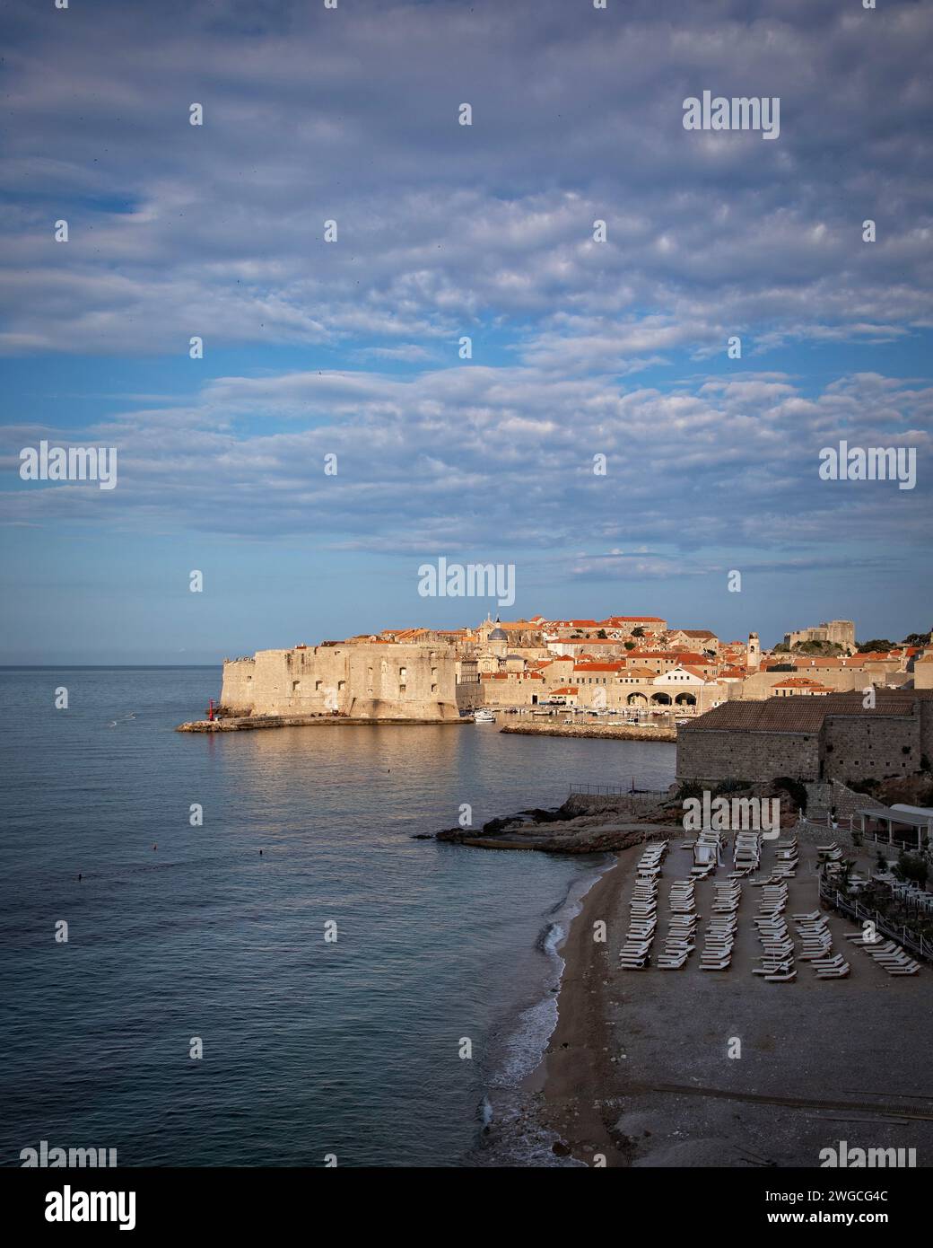 Dubrovnik begins to glow in the morning sun along the Adriatic Sea in ...