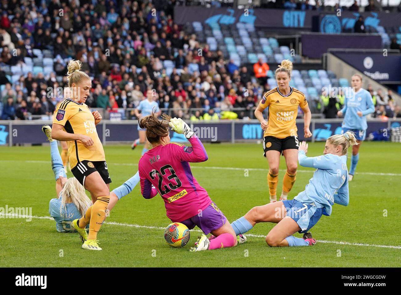 Leicester City goalkeeper Lize Kop saves at the feet of Manchester City ...