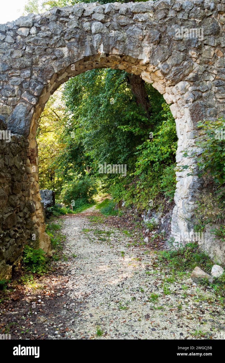 An old archway of natural stone on a sunny day Stock Photo - Alamy