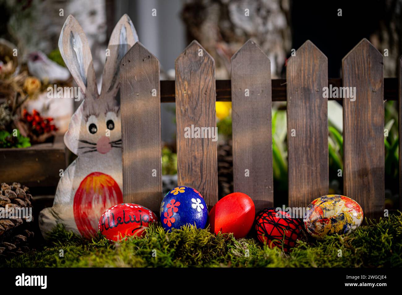 Whimsical Easter Scene: Handcrafted Eggs, Cute Bunny Cutout, and Rustic ...