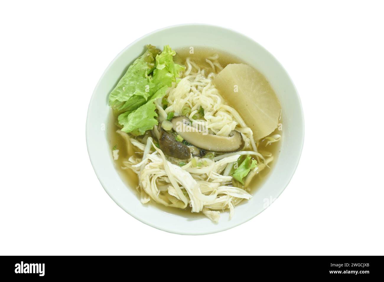 Chinese yellow egg noodles topping slice boiled chicken in soup on bowl ...