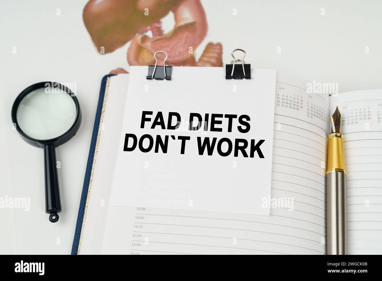 Medical concept. On the table there is a magnifying glass and a notepad ...