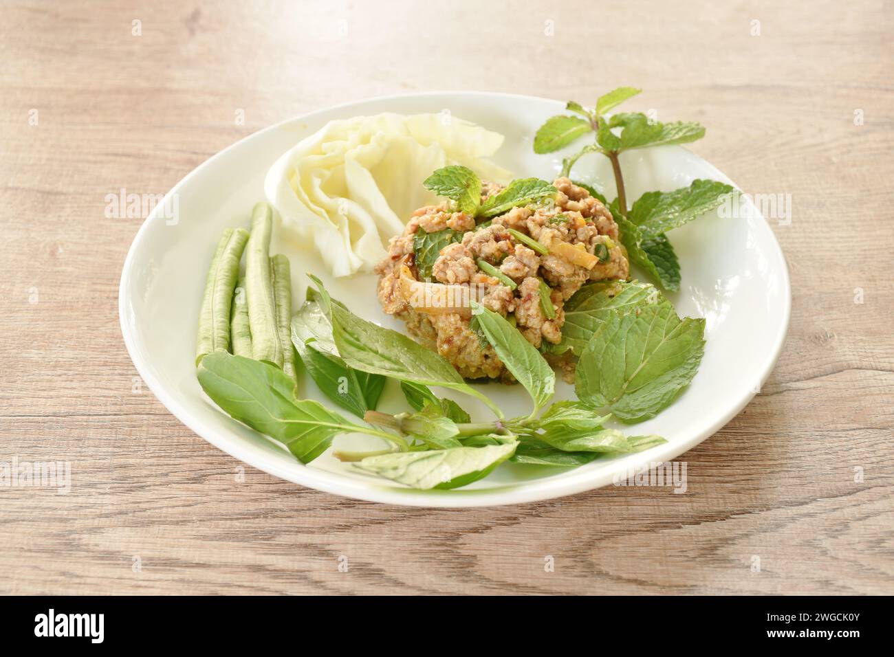 Thai spicy chop pork and slice skin with liver salad on plate Stock ...