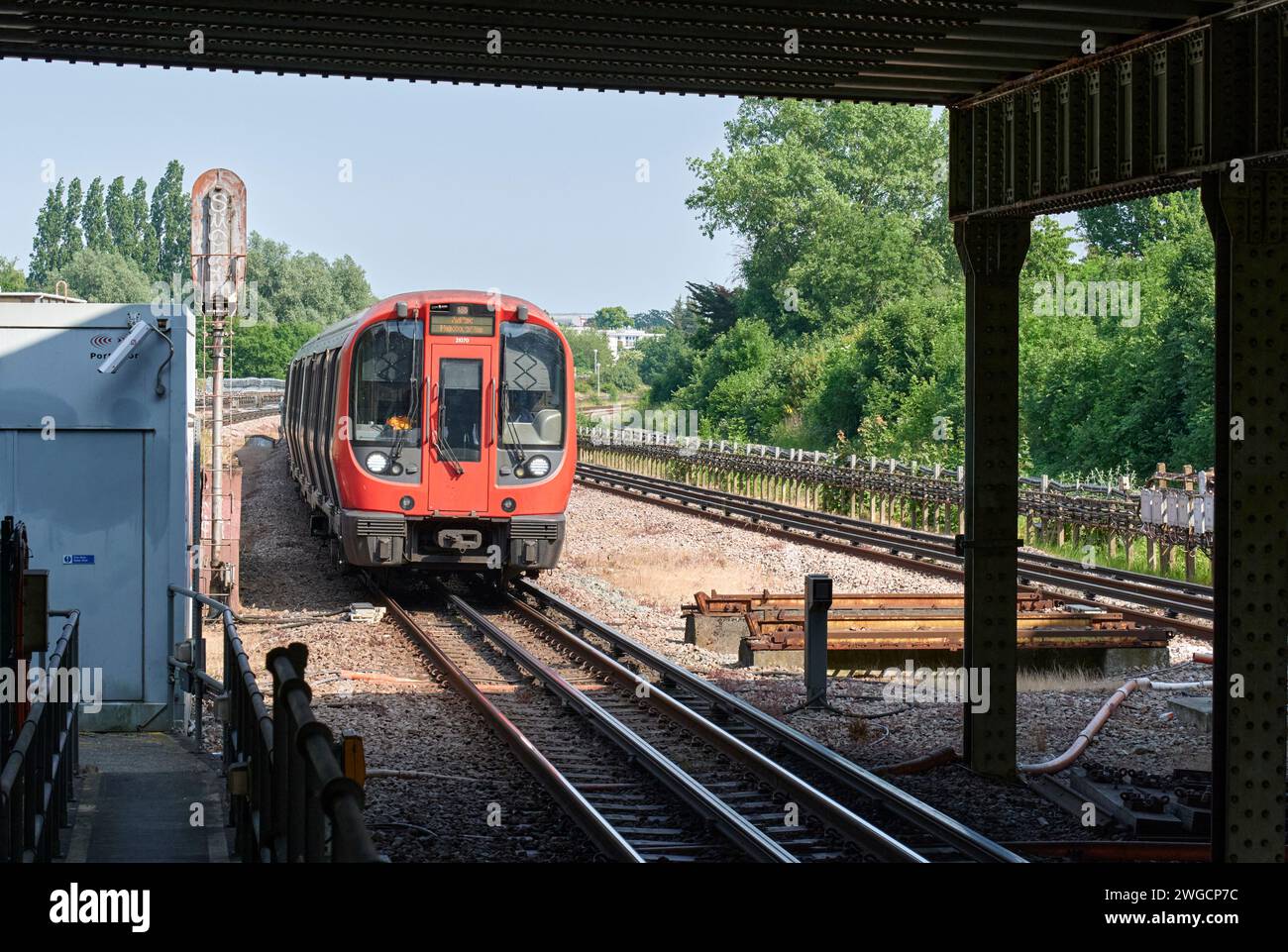 A Metropolitan line of S8 stock on the northbound local line approaches ...