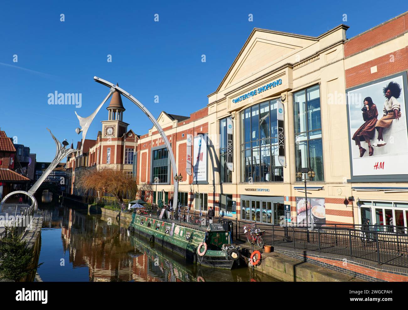 South-facing frontage of Waterside Shopping centre with River Witham ...