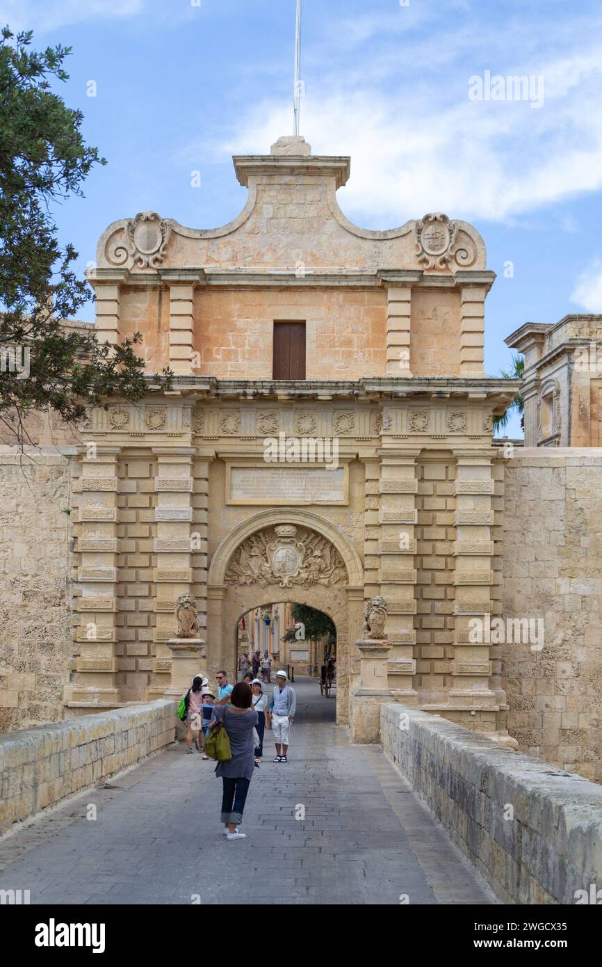 Mdina, Malta - June 9th 2016: Tourists on the bridge leading to Mdina ...