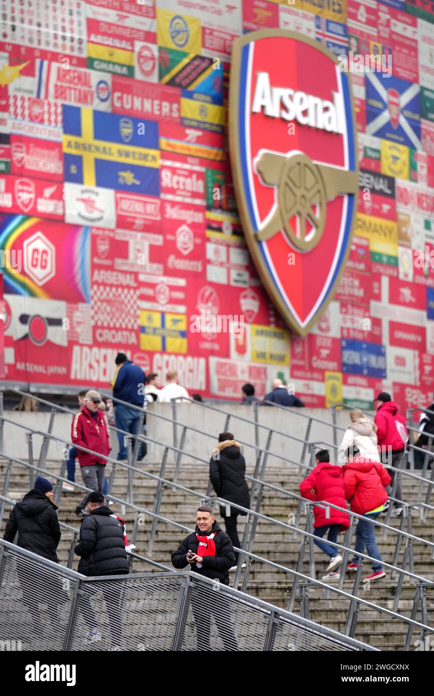 Arsenal fans make their way to the stadium ahead of the Premier League ...