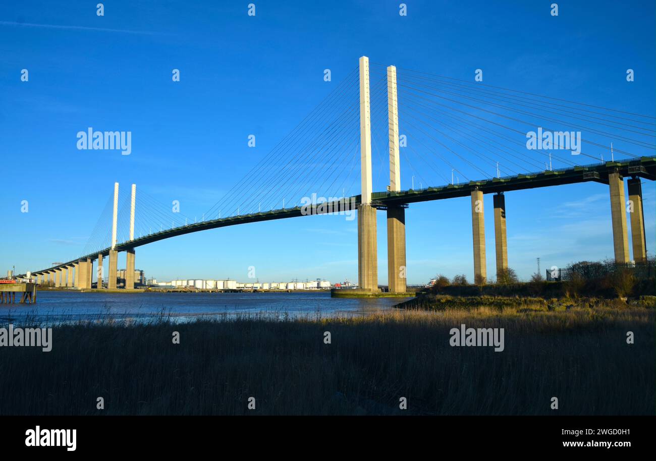 Traffic crossing the Queen Elizabeth II Bridge under an evening sky ...