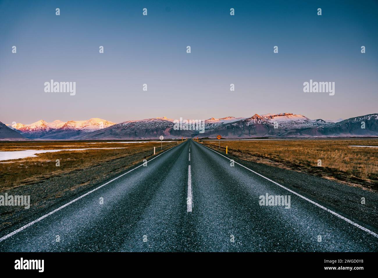 A Ring road number 1 in southern Iceland with mountains and glaciers in ...
