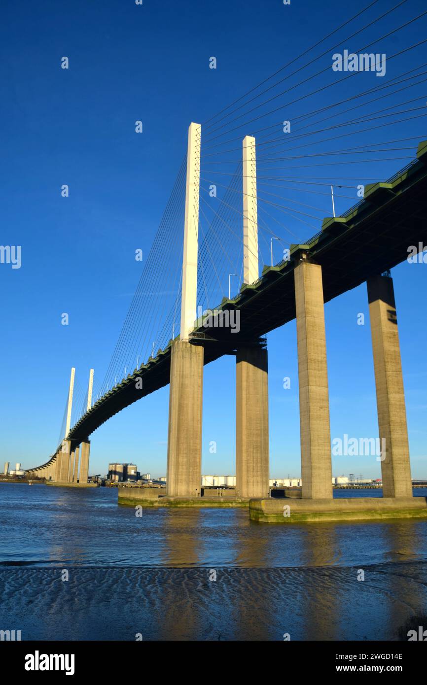Traffic crossing the Queen Elizabeth II Bridge under an evening sky ...