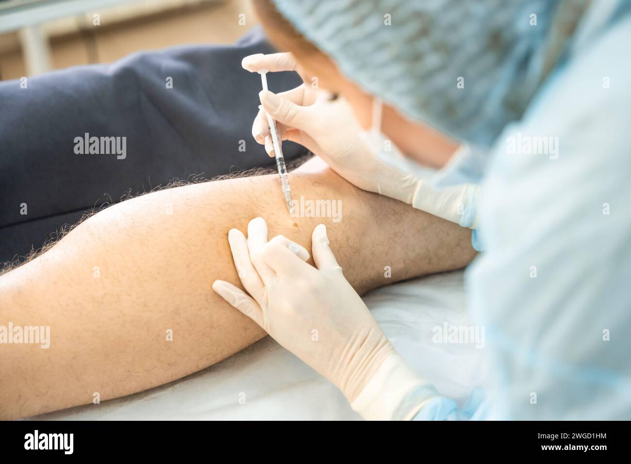 Dermatologist surgeon gives pain relief with an injection instead of ...