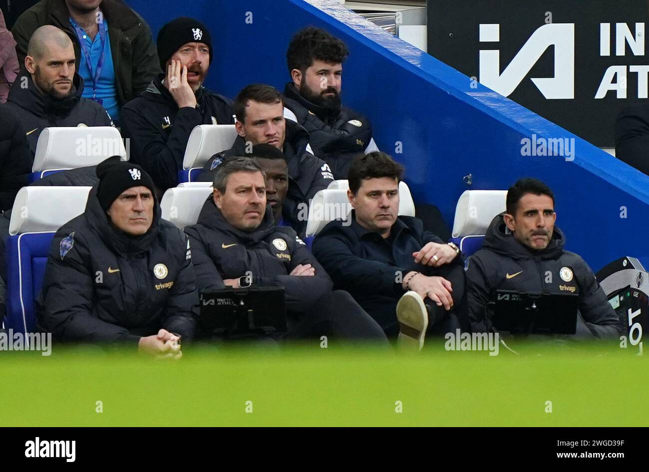 Chelsea manager Mauricio Pochettino (second right) and staff look on ...