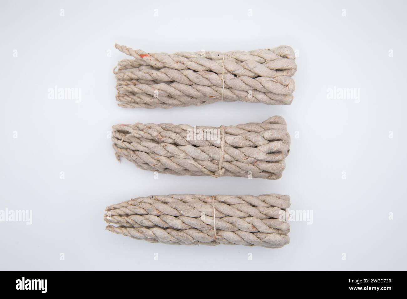 Bundles of rope incense made of mixtures of Himalayan herbs shot on ...