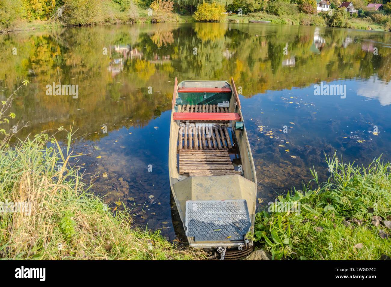 Beautiful views of the river Berounka a Wooden boats in the autumn ...