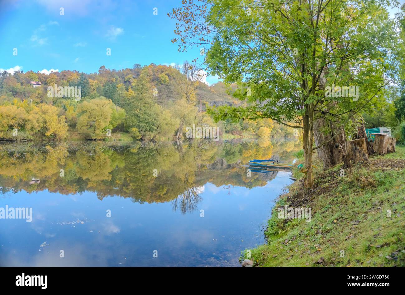 Beautiful views of the river Berounka a Wooden boats in the autumn ...