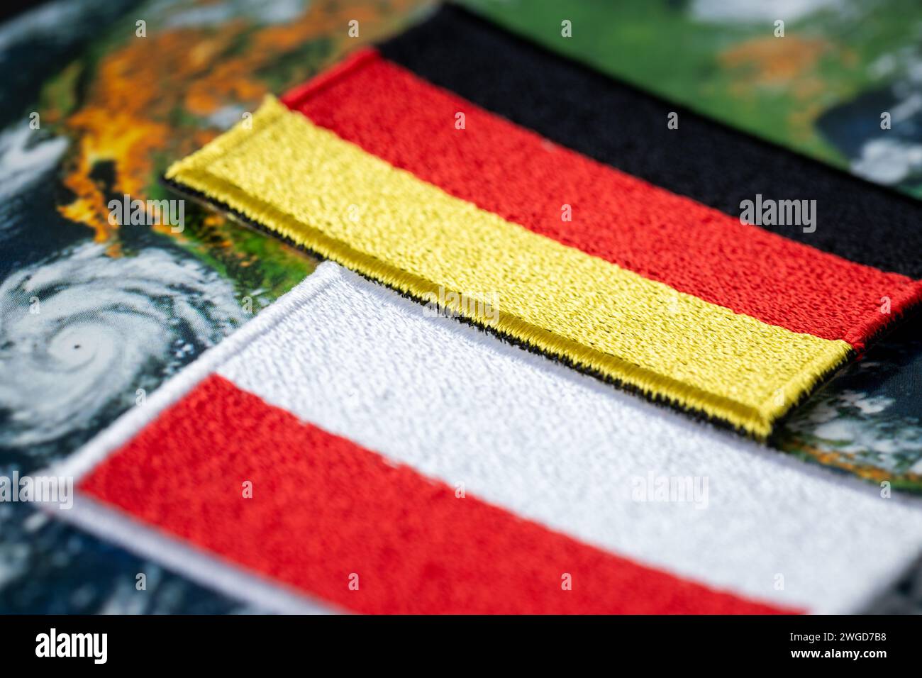Germany and Poland, Symbols of both countries against the background of ...