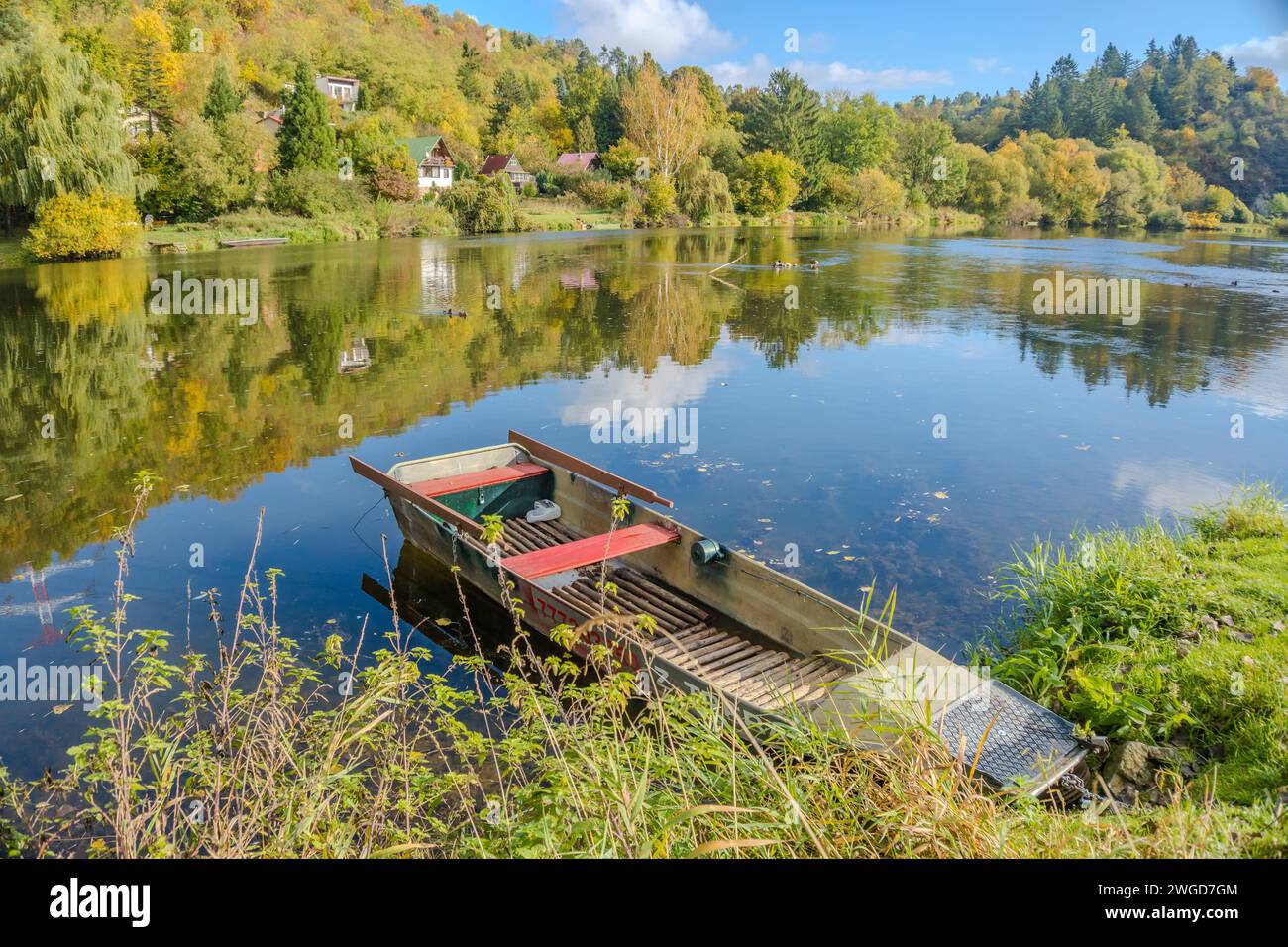 Beautiful views of the river Berounka a Wooden boats in the autumn ...
