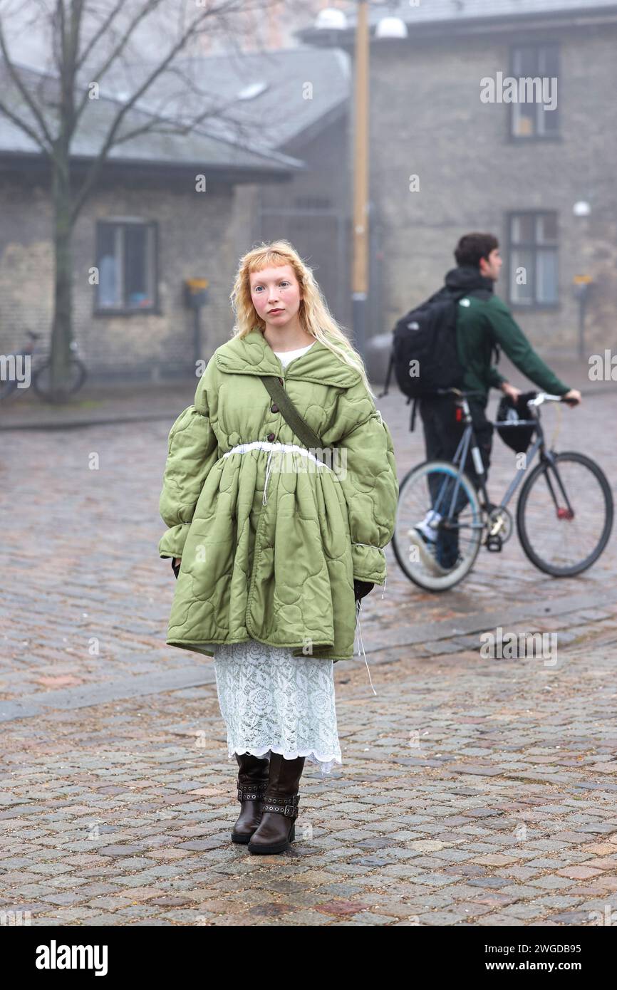 A fashionista poses for photographs before the Roif Ekroth AW 2024 ...