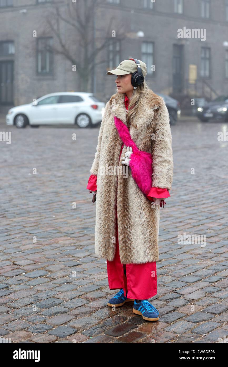 A fashionista poses for photographs before the Roif Ekroth AW 2024 ...