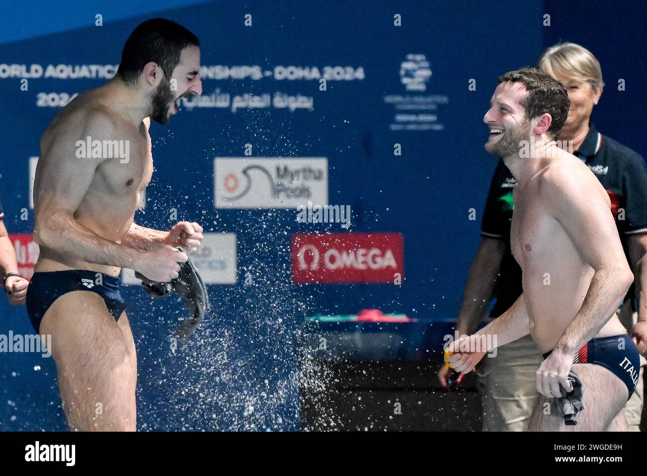 Lorenzo Marsaglia and Giovanni Tocci of Italy react after winning the silver medal in the diving ...