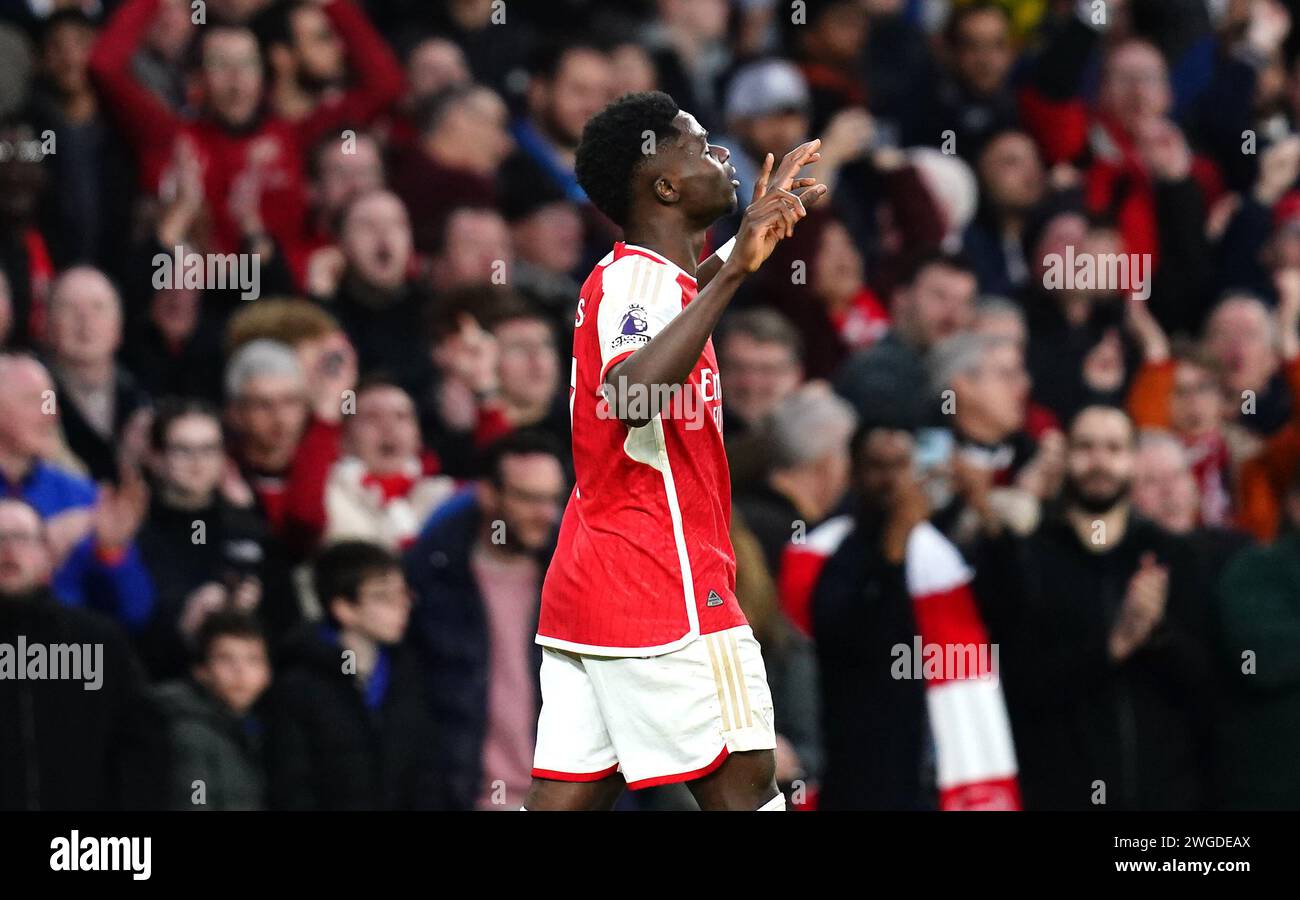 Arsenal's Bukayo Saka celebrates scoring their side's first goal of the ...