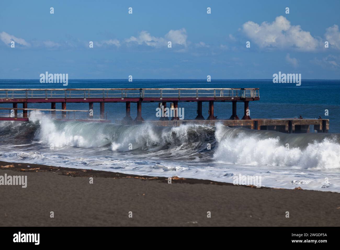 Débarcadère de Saint-Paul (Landing of Saint-Paul) with the waves of the ...
