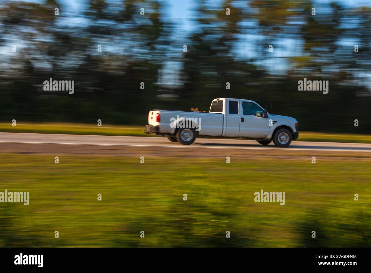 Car speeding on the Interstate 10 highway, Louisiana Stock Photo - Alamy