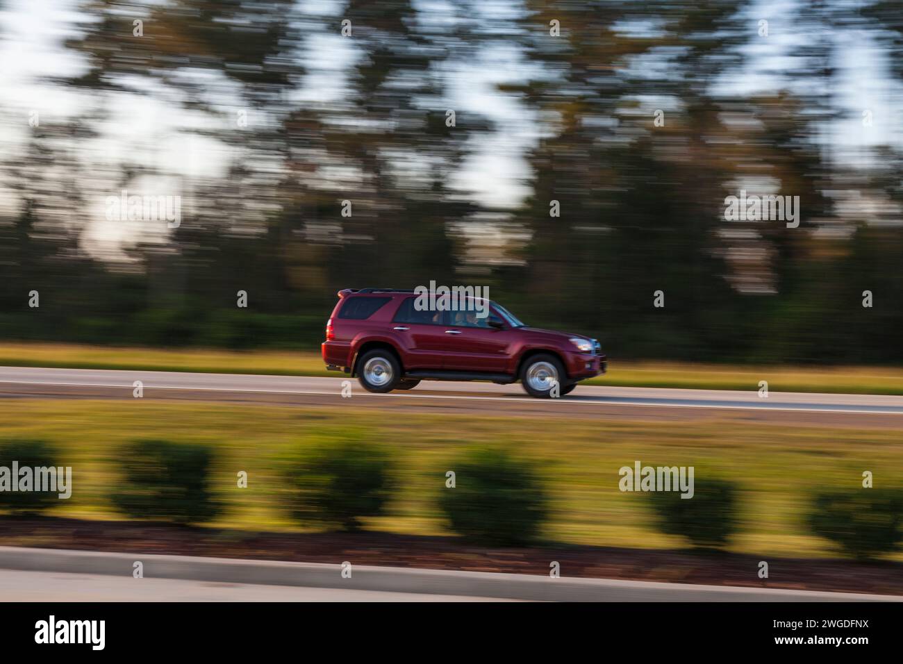 Car speeding on the Interstate 10 highway, Louisiana Stock Photo - Alamy