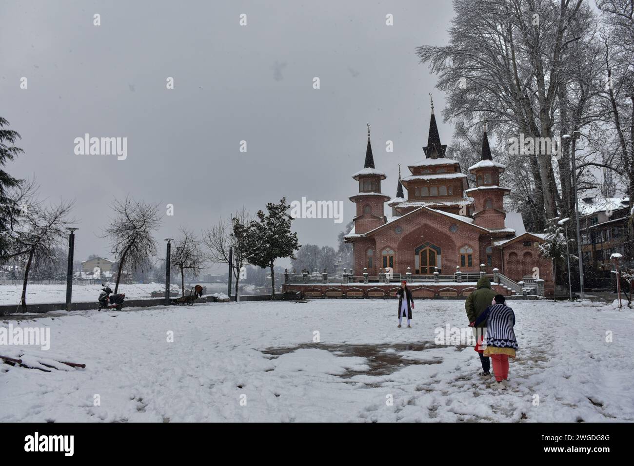 Indian tourists walk along the compound of Masjid Bilal (RA) during ...