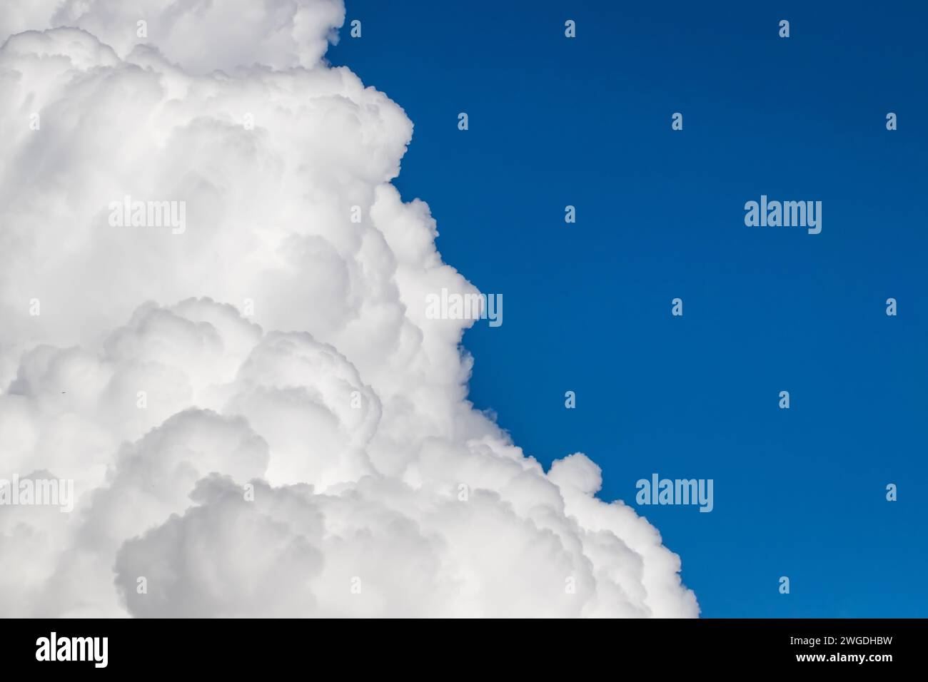 Floating clouds in blue hi-res stock photography and images - Alamy