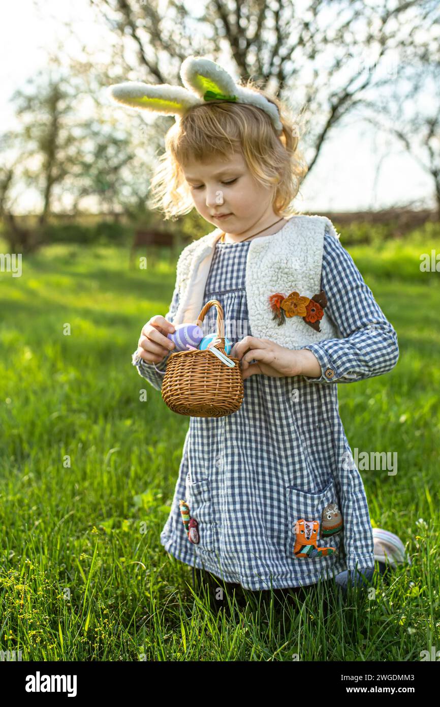 Easter enchantment . child's hidden eggs in a playful outdoor pursuit ...