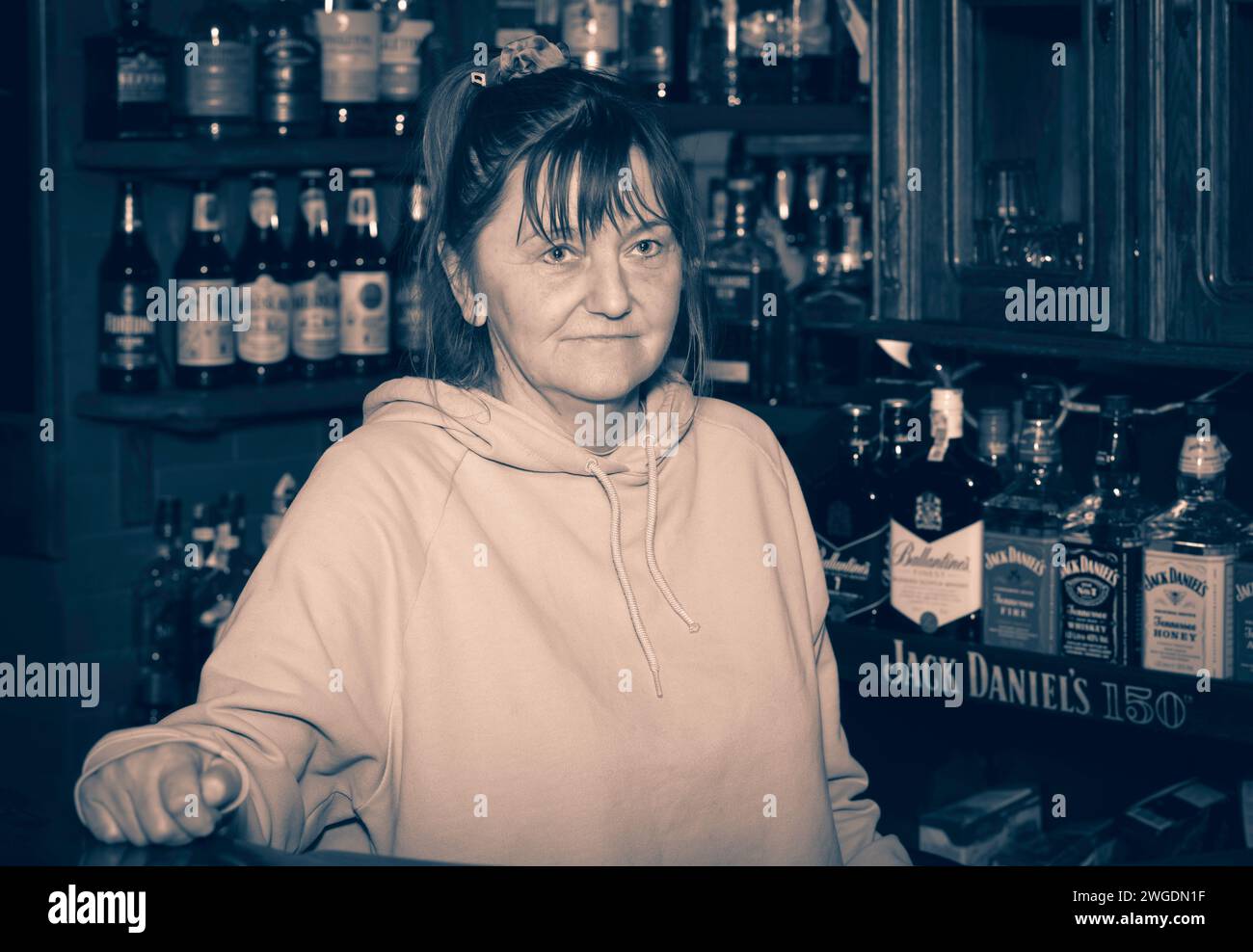 Lady Dorota, owner of a pub, local legend. Portrait of a mature woman ...