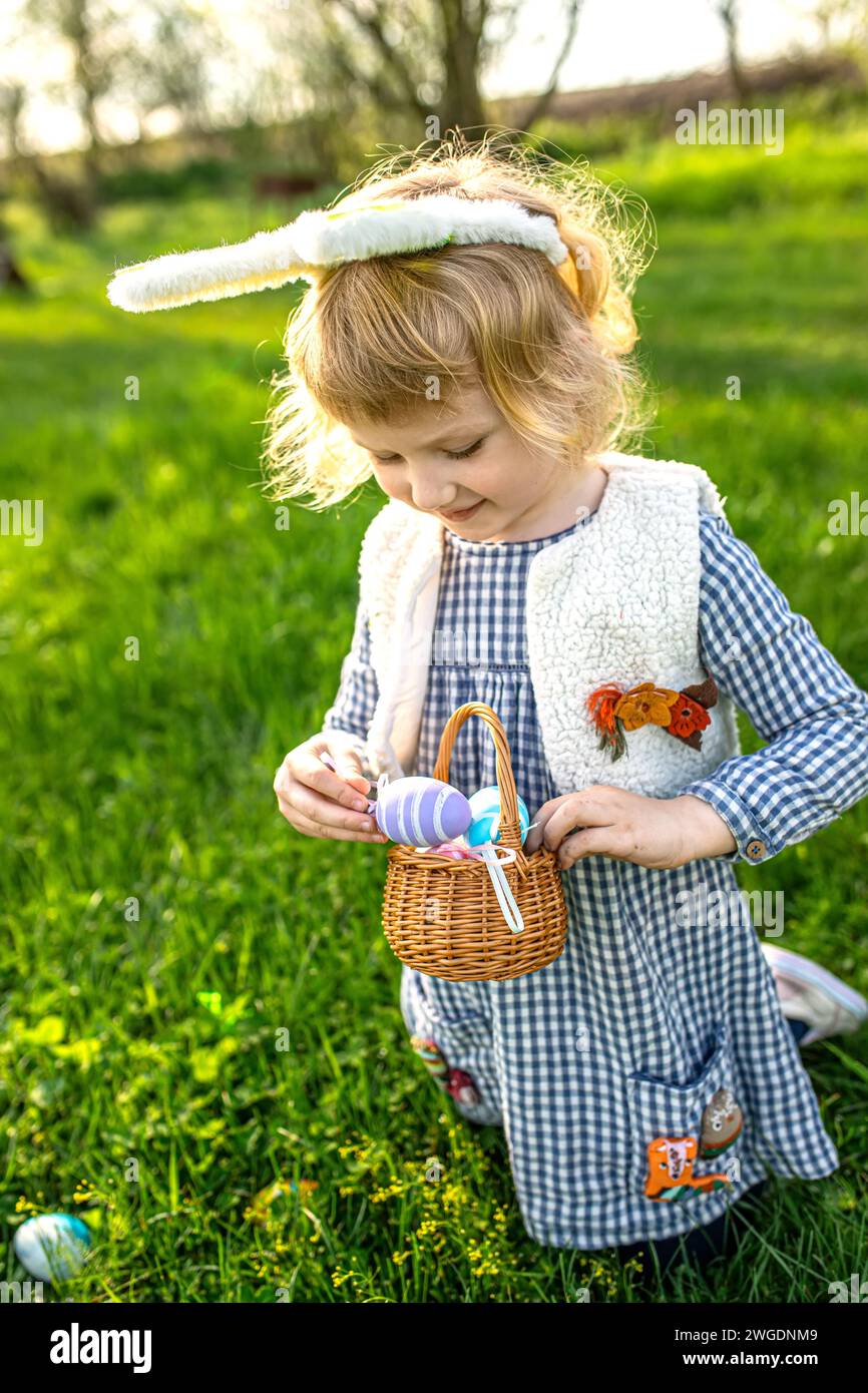 celebration of spring and Easter . young girl, filled with excitement ...