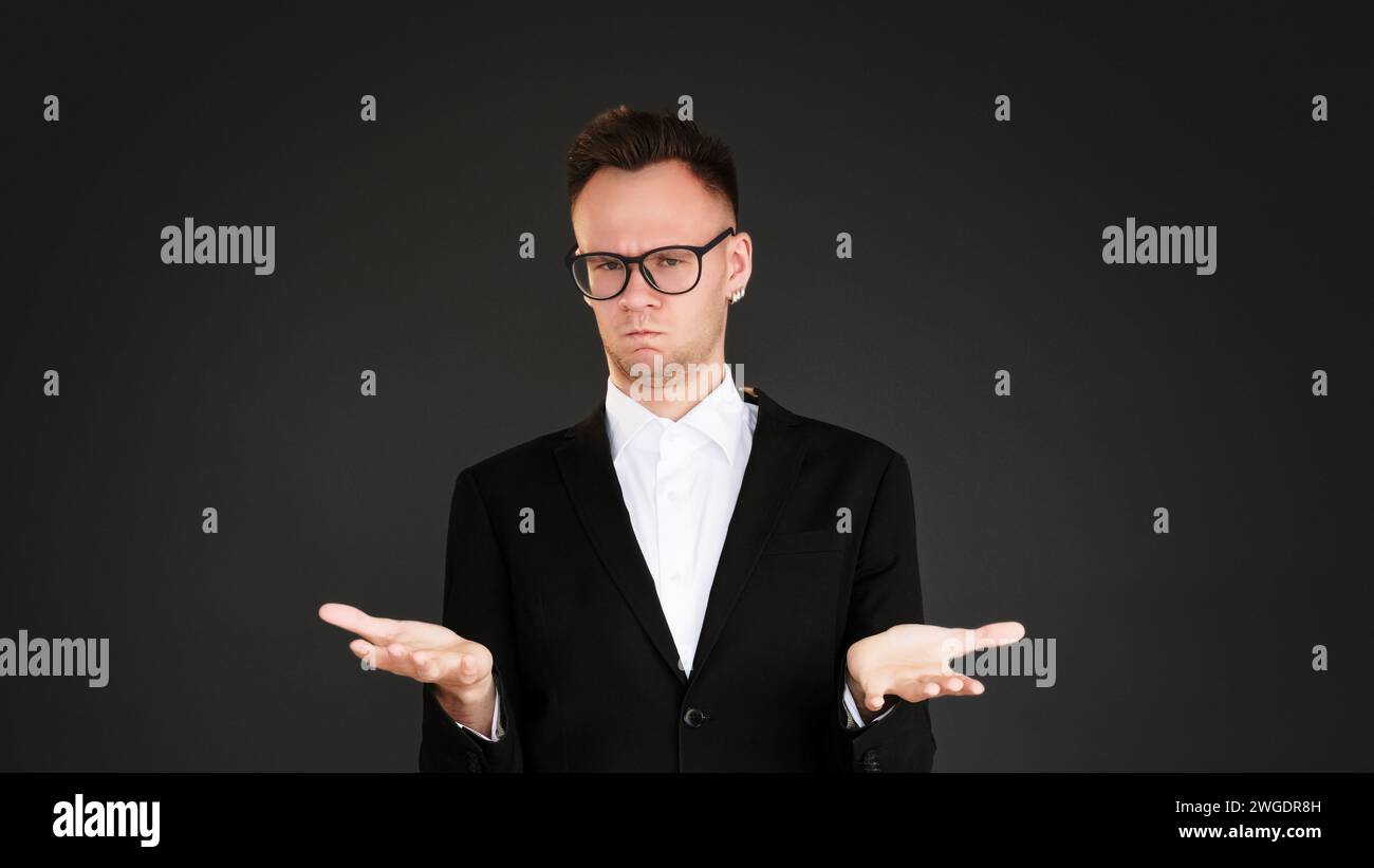 Displeased expression wtf face shocked man shrug Stock Photo - Alamy