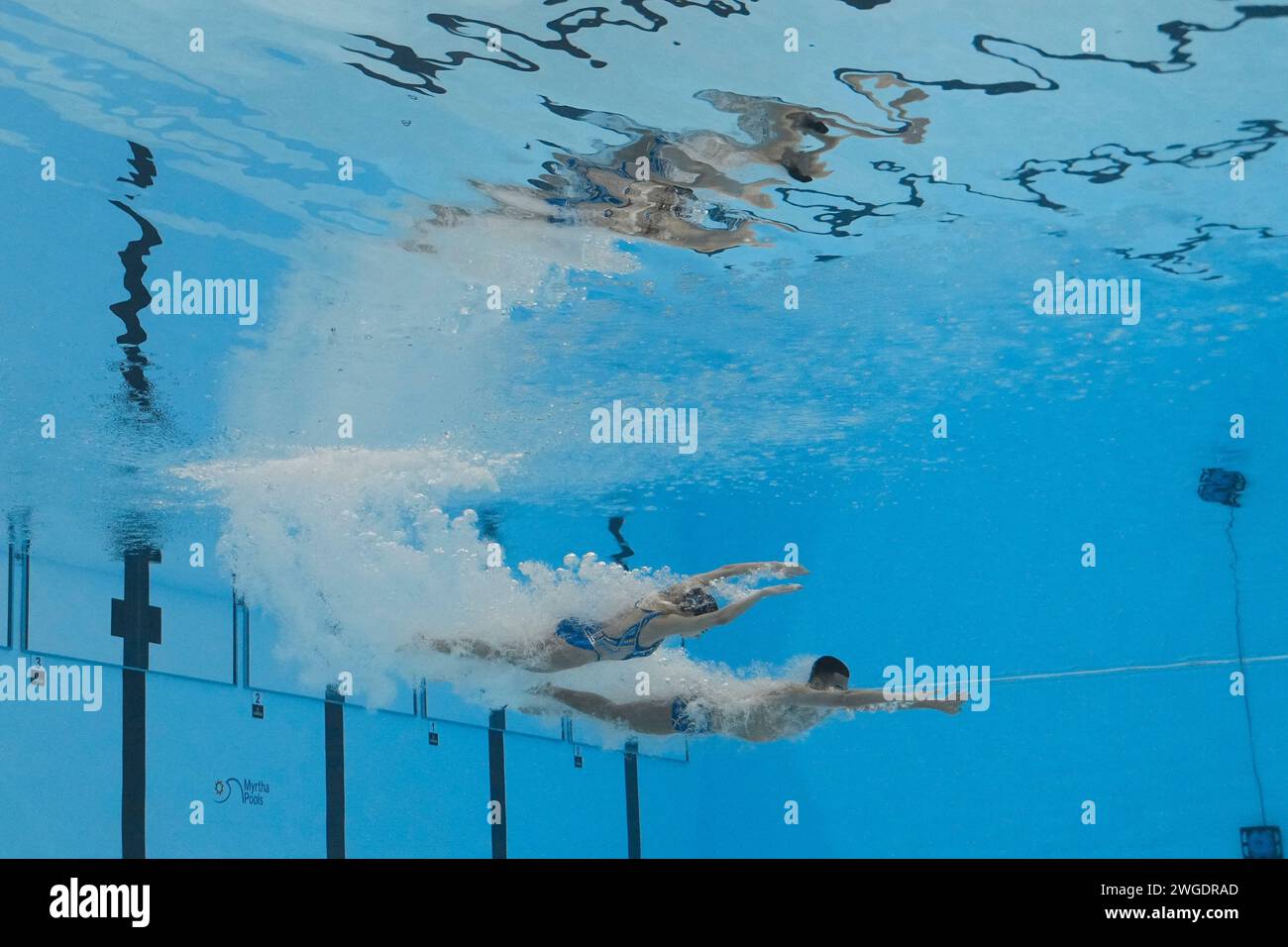 Cheng Wentao and Shi Haoyu, of China, compete in the mixed duet ...