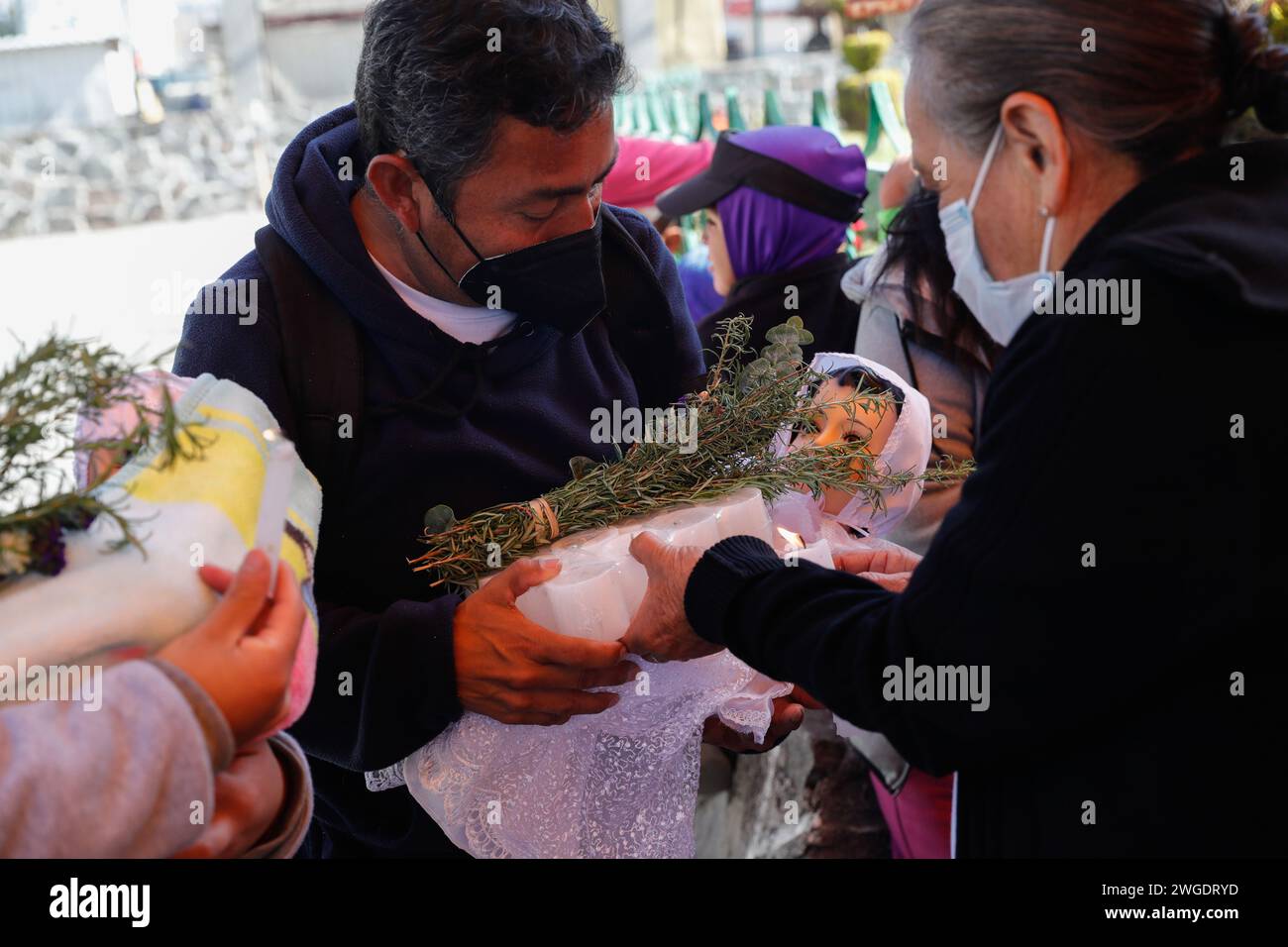 Non Exclusive: Catholic devotees cooed at the God child and blessed ...