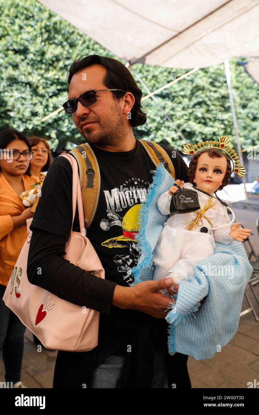Non Exclusive: Catholic devotees cooed at the God child and blessed ...