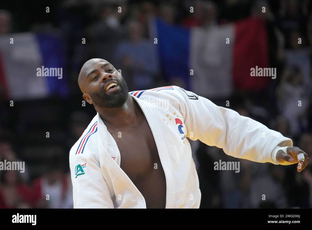 Teddy Riner of France celebrates after defeating South Korea's Kim ...